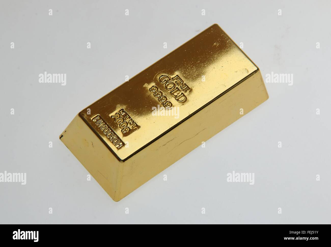One Gold Ingot Stock Photo - Alamy