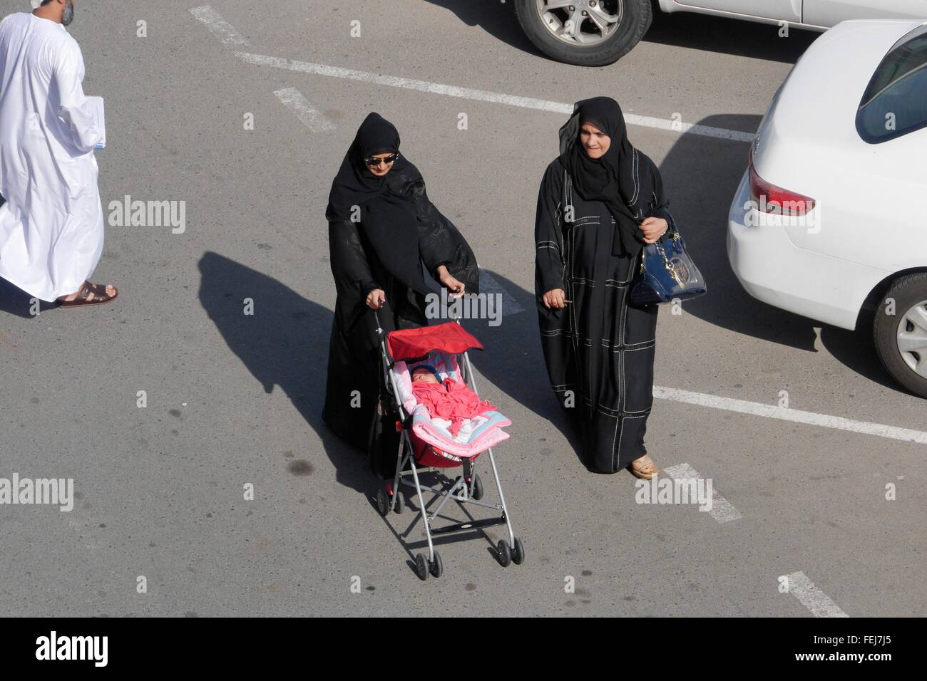MUSCAT, OMAN Muttrah old town district with corniche and souk. Young ...
