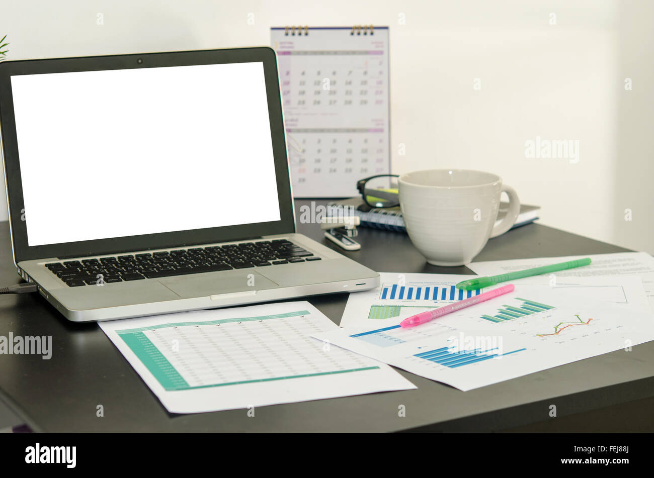 business workplace and computer and printed data sheet Stock Photo - Alamy