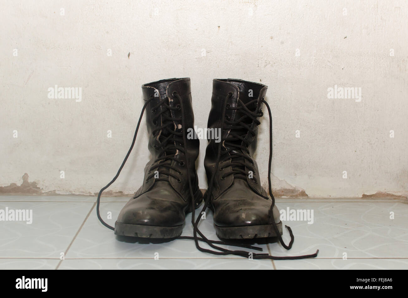 Military boots on the ground Stock Photo - Alamy