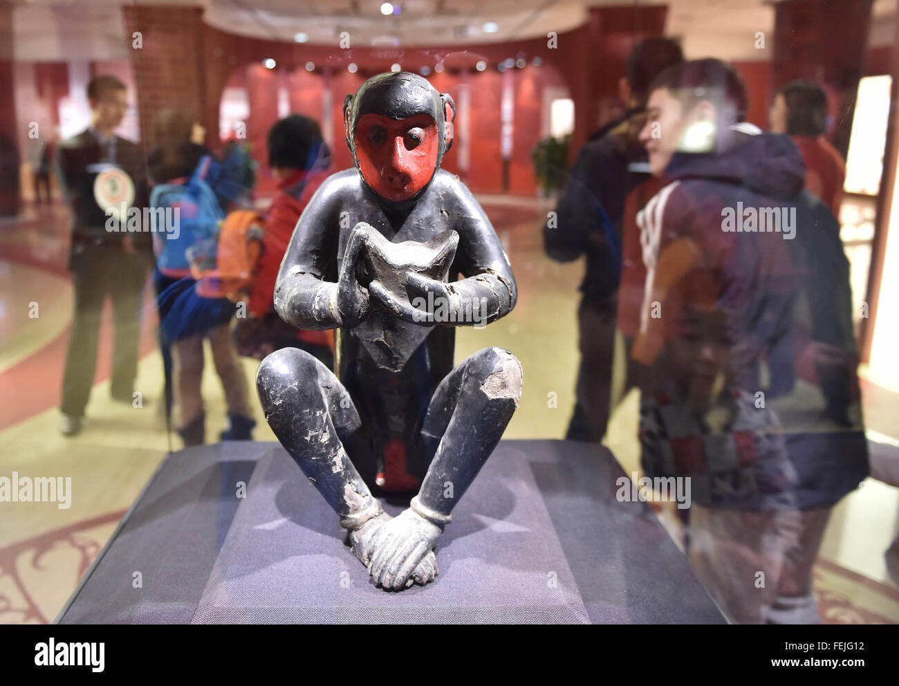 Beijing, China. 8th Feb, 2016. Visitors view an exhibit at the Capital ...