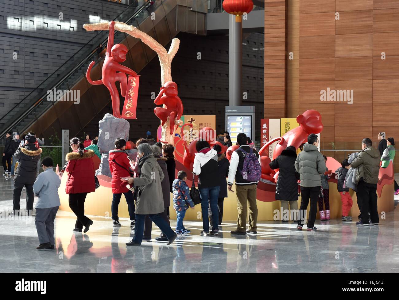 Beijing, China. 8th Feb, 2016. Visitors view an exhibit at the Capital ...