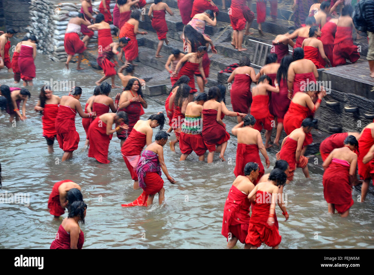Kathmandu, Nepal. 08th Feb, 2016. Nepalese Hindu women taking holy bath ...