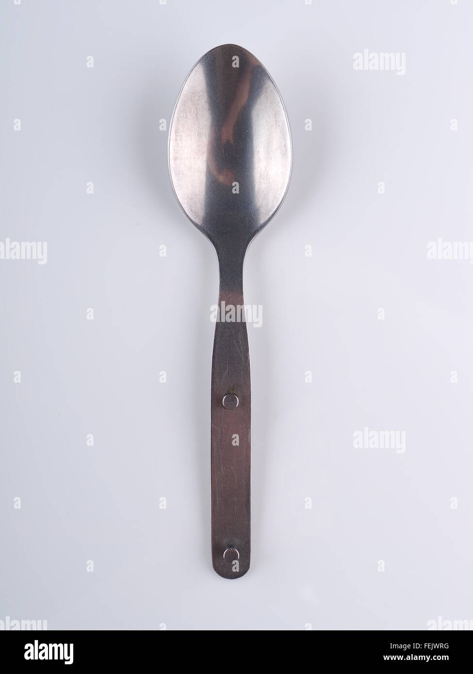 spoon on gray background Stock Photo - Alamy