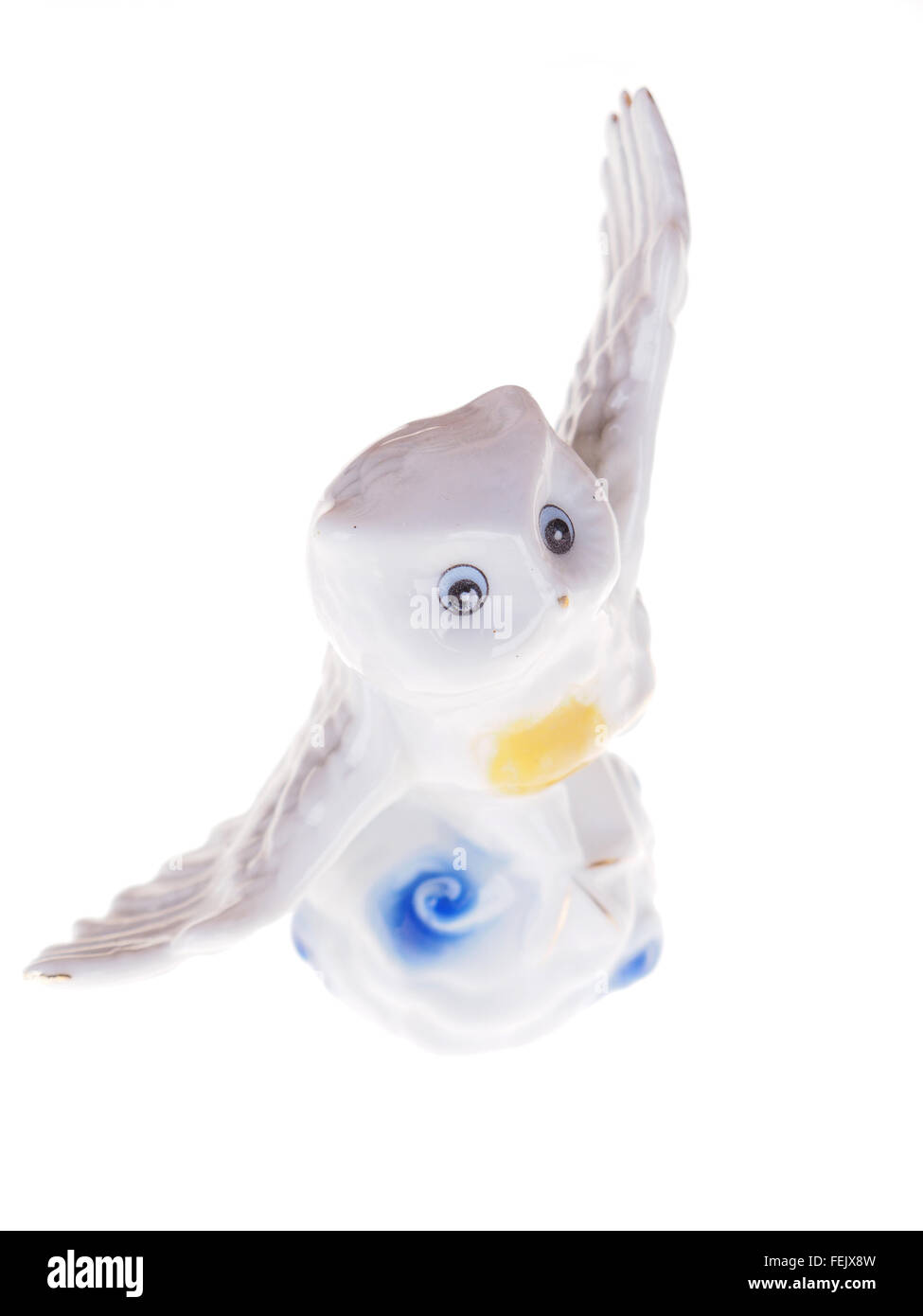 Ceramic toy owl on a white background Stock Photo - Alamy