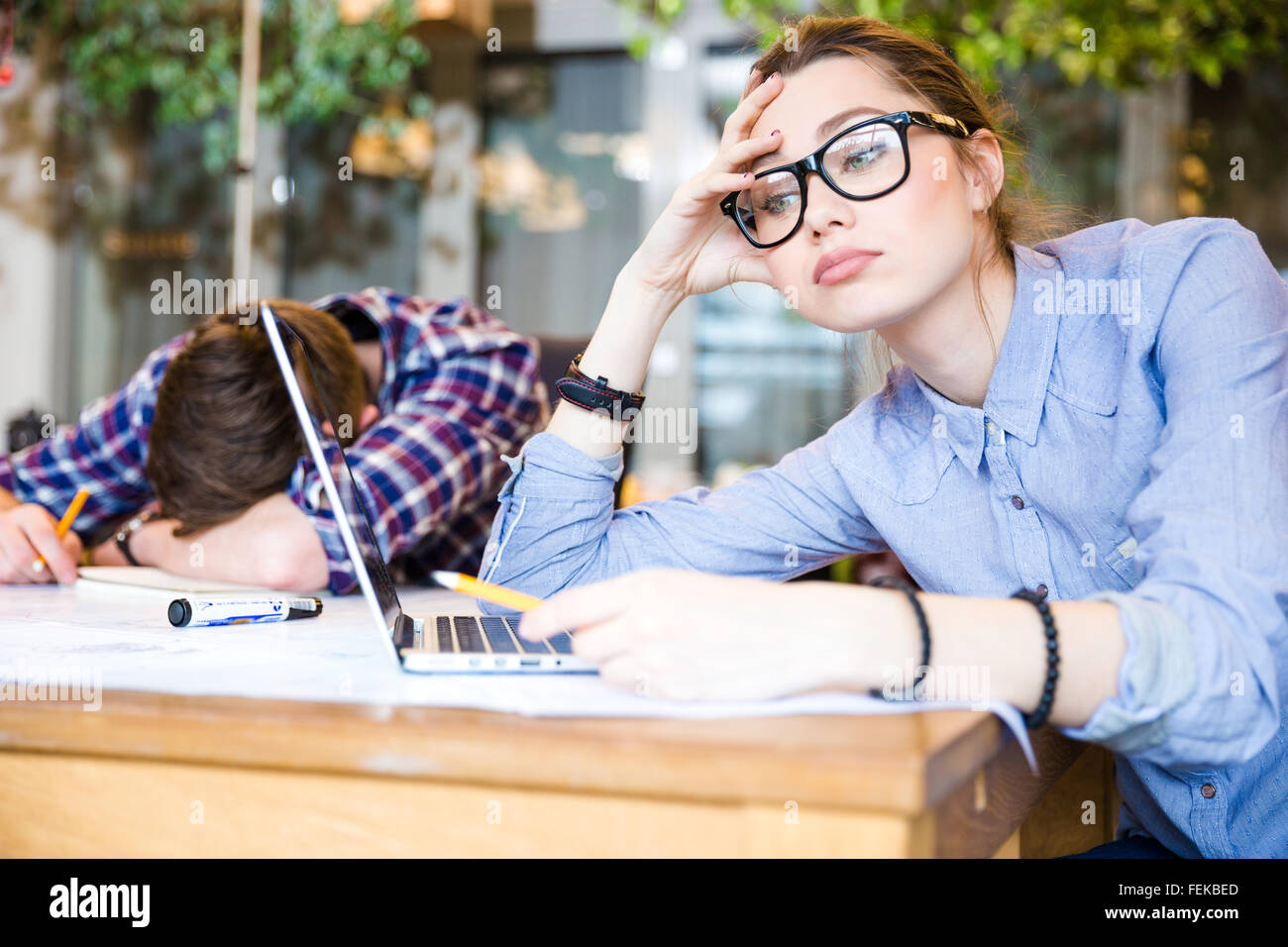 Sleepy overworked business people sitting and sleeping in meeting room ...
