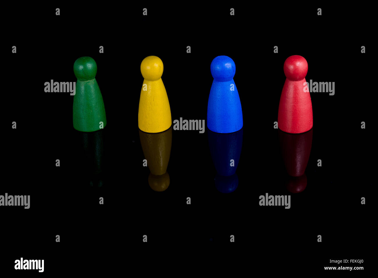 Primary colored game pieces - as visual metaphor for concept of market ...