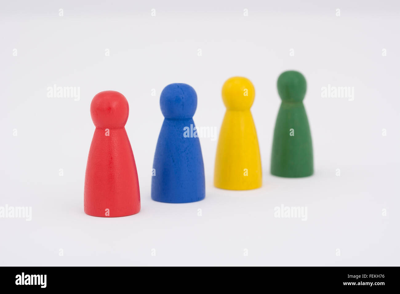 Primary colored game pieces - as visual metaphor for concept of market ...