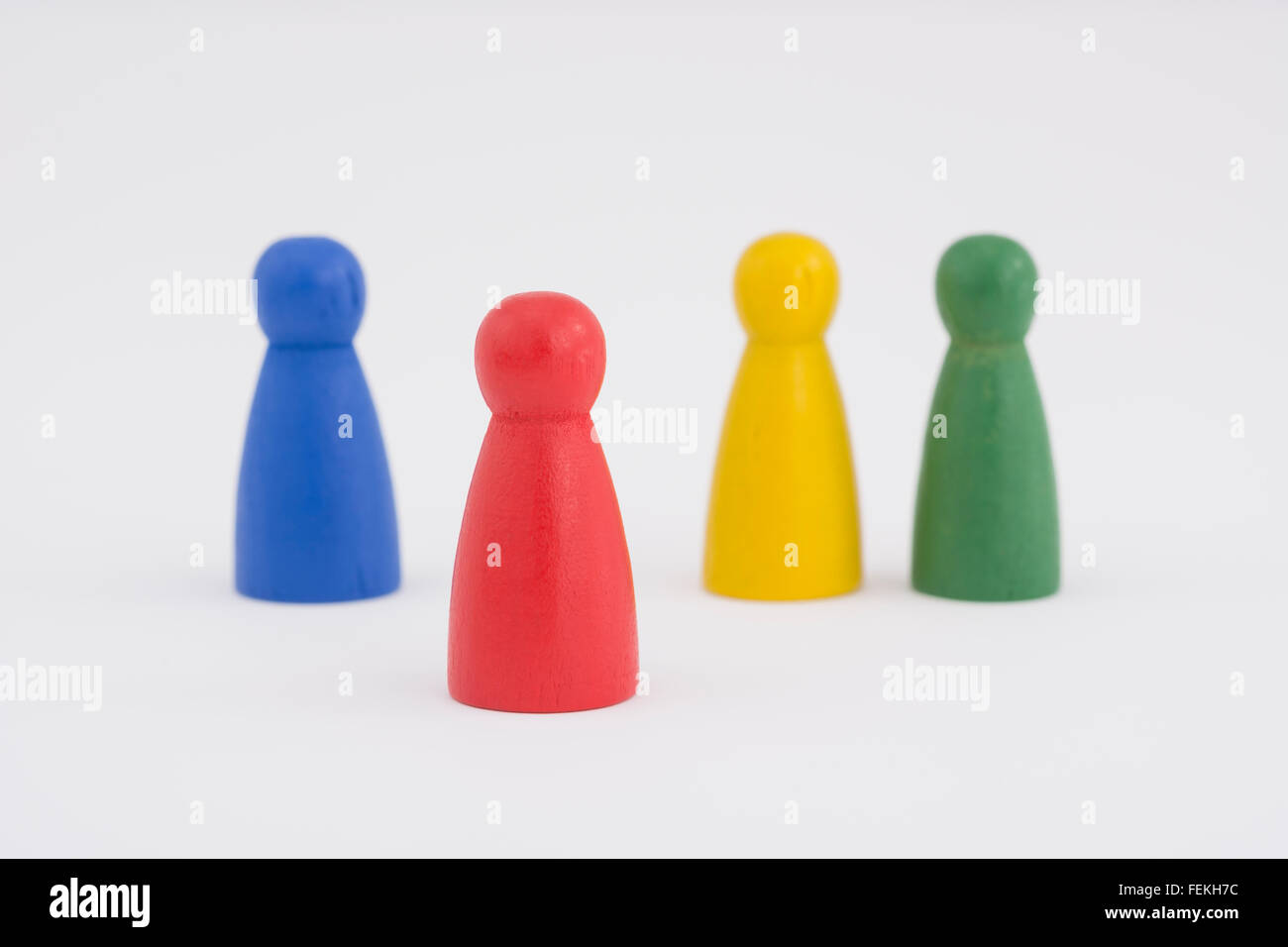 Primary colored game pieces - as visual metaphor for concept of market ...