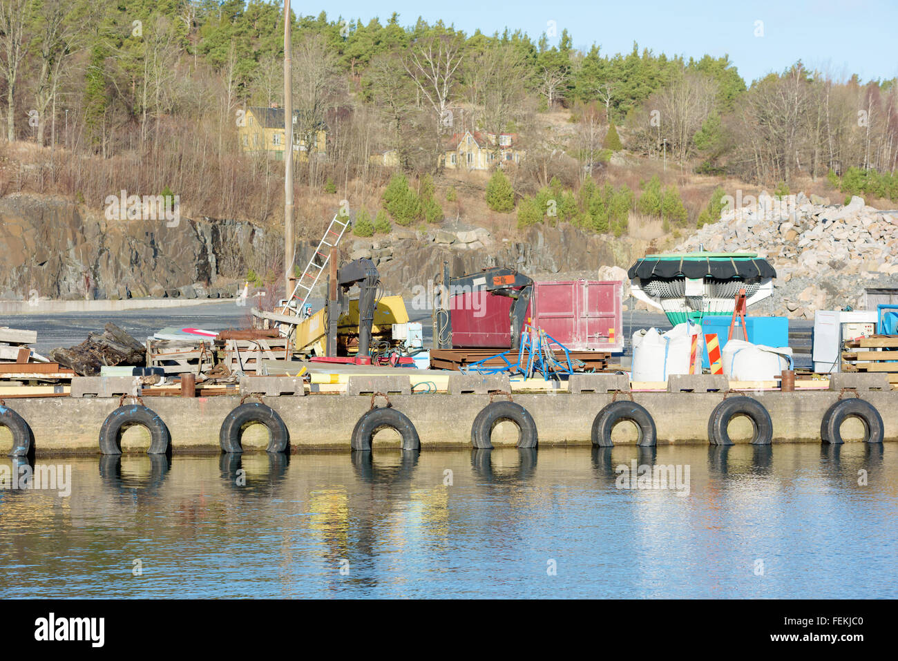 A pile of metal debris stored at the docks in an open pit quarry Stock ...