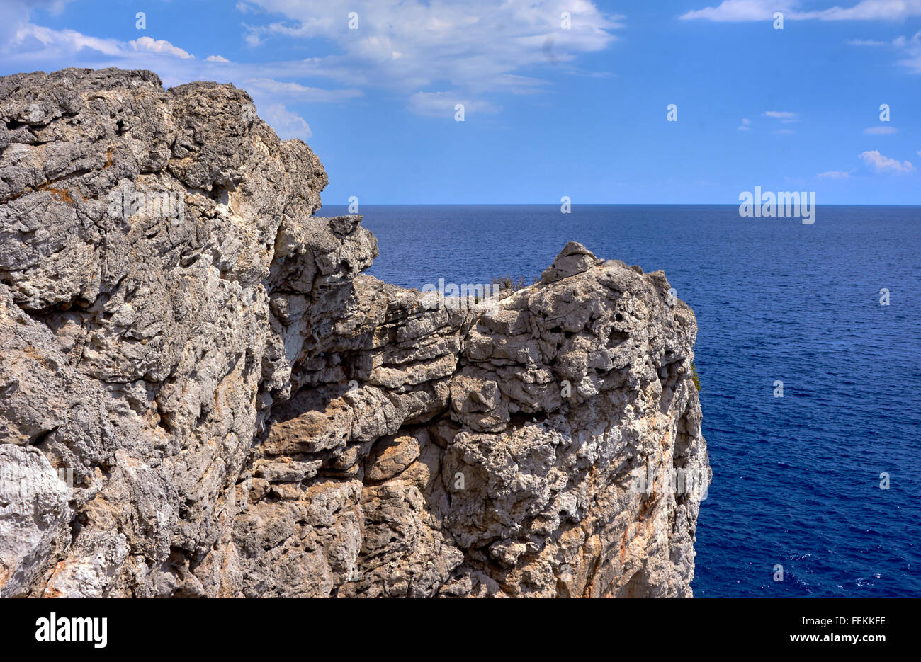 rocky cliff on the seacoast island of Rhodes Stock Photo - Alamy