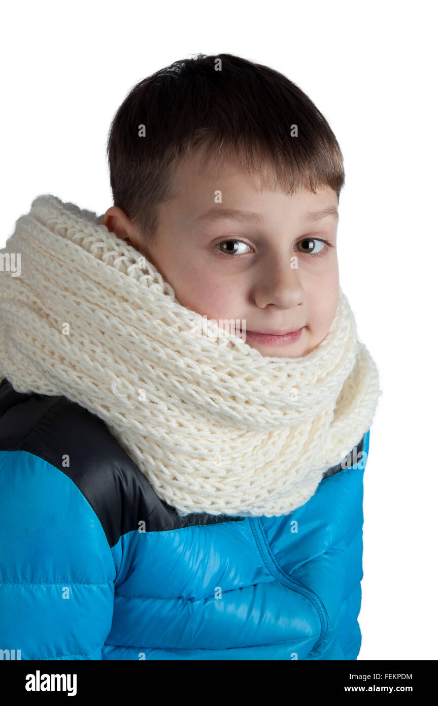 Cute boy in blue jacket and white scarf isolated on white background ...