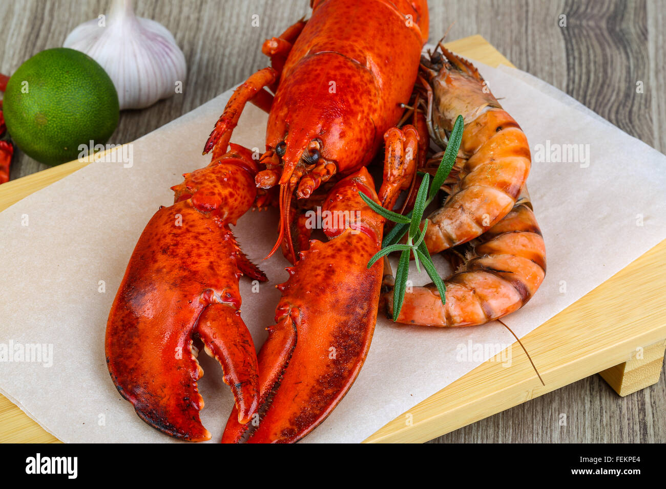 Big cooked lobster and tiger shrimps ready for eating Stock Photo - Alamy