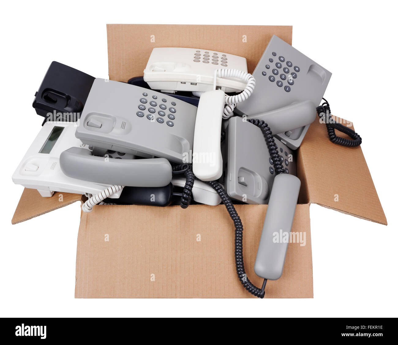 A cardboard box with cheap mass production corded phones which are ...
