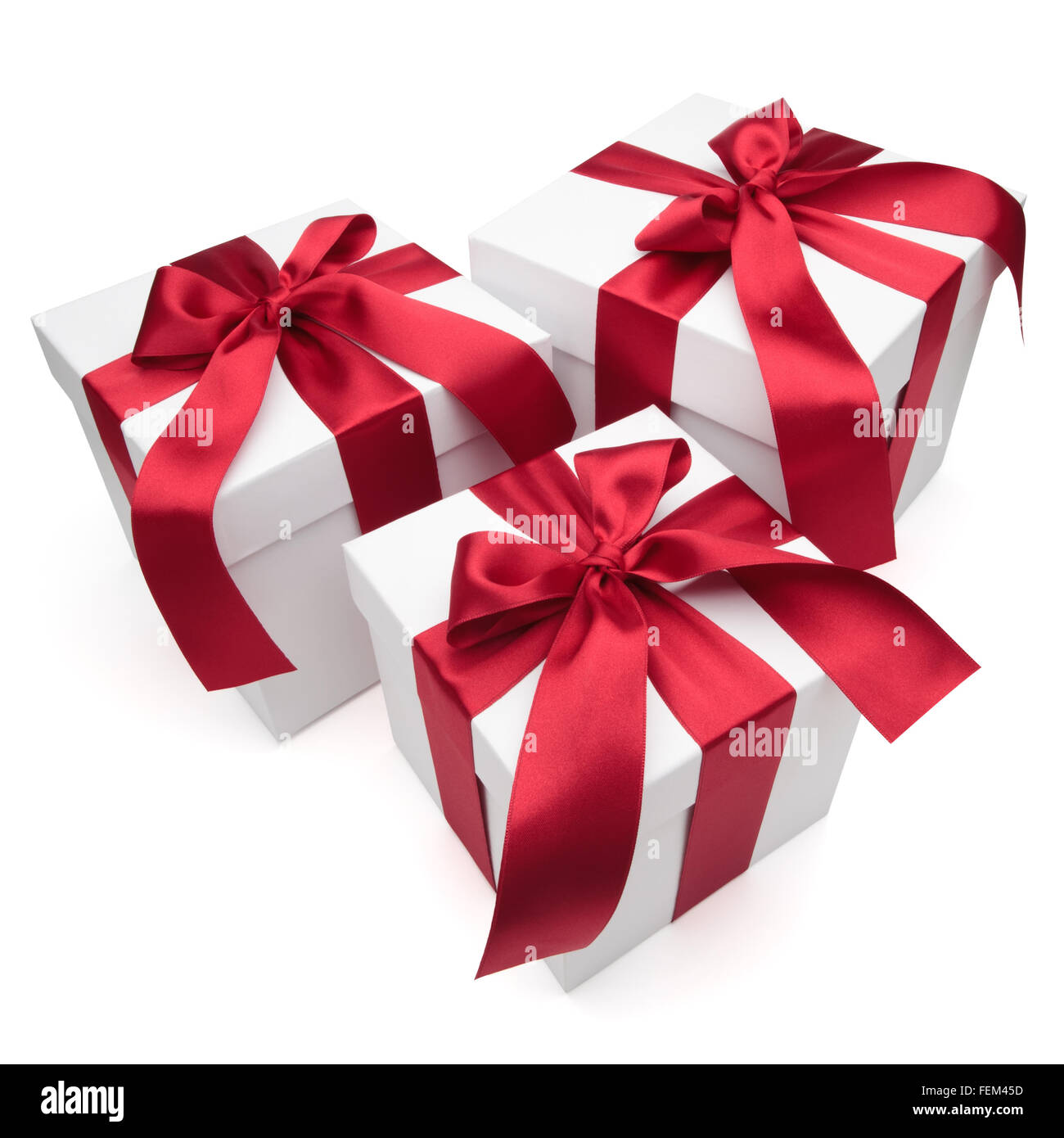 Gift boxes with red ribbons and bows isolated on the white background ...
