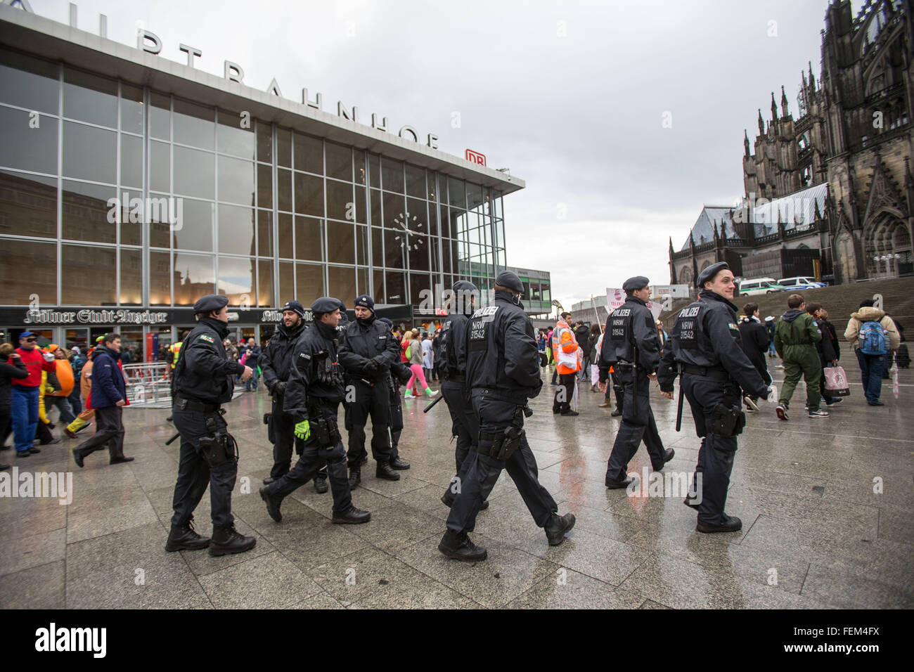 Cologne, Germany. 08th Feb, 2016. Police officers patrol the area aroun ...