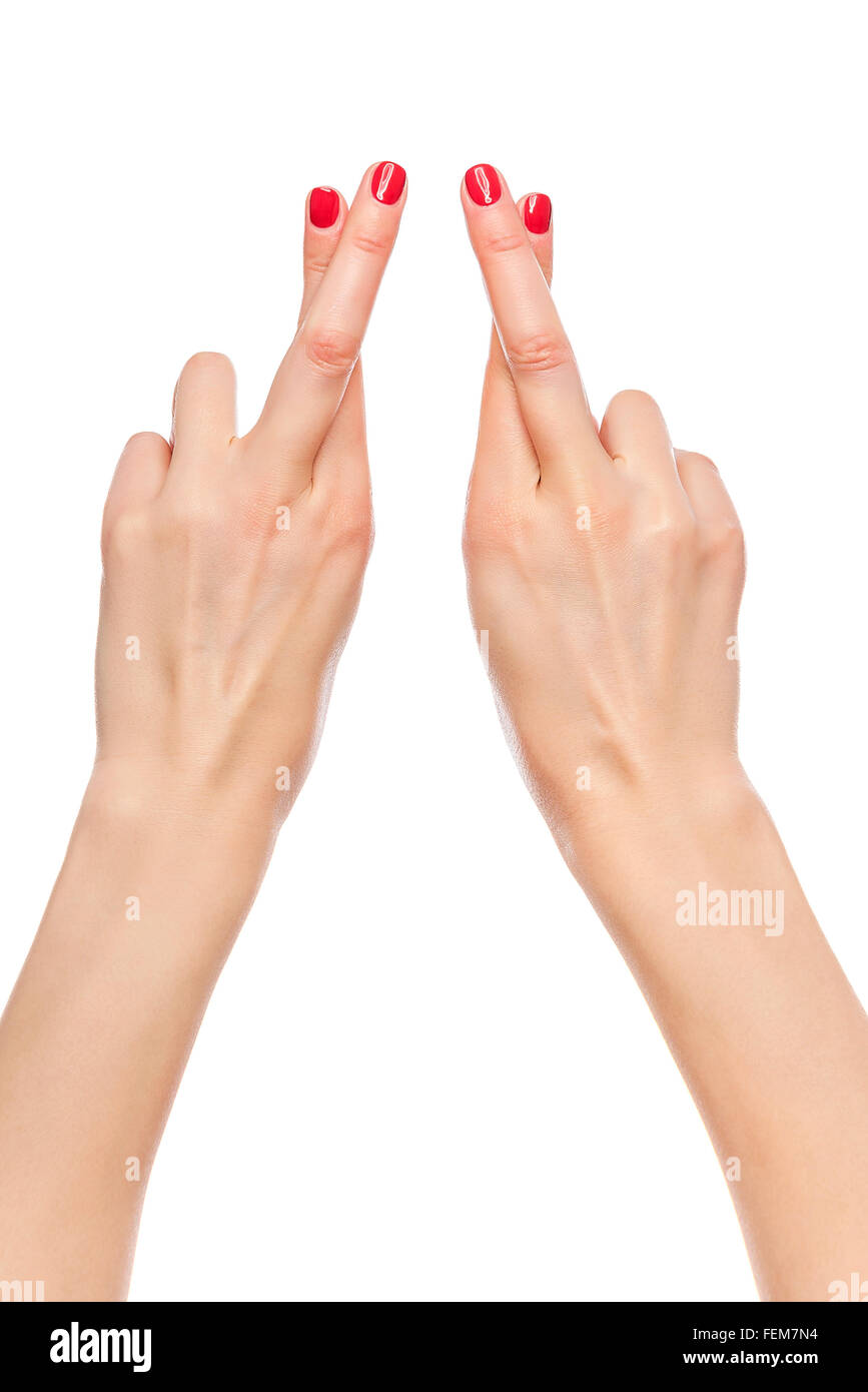Female hand fingers crossed Stock Photo - Alamy