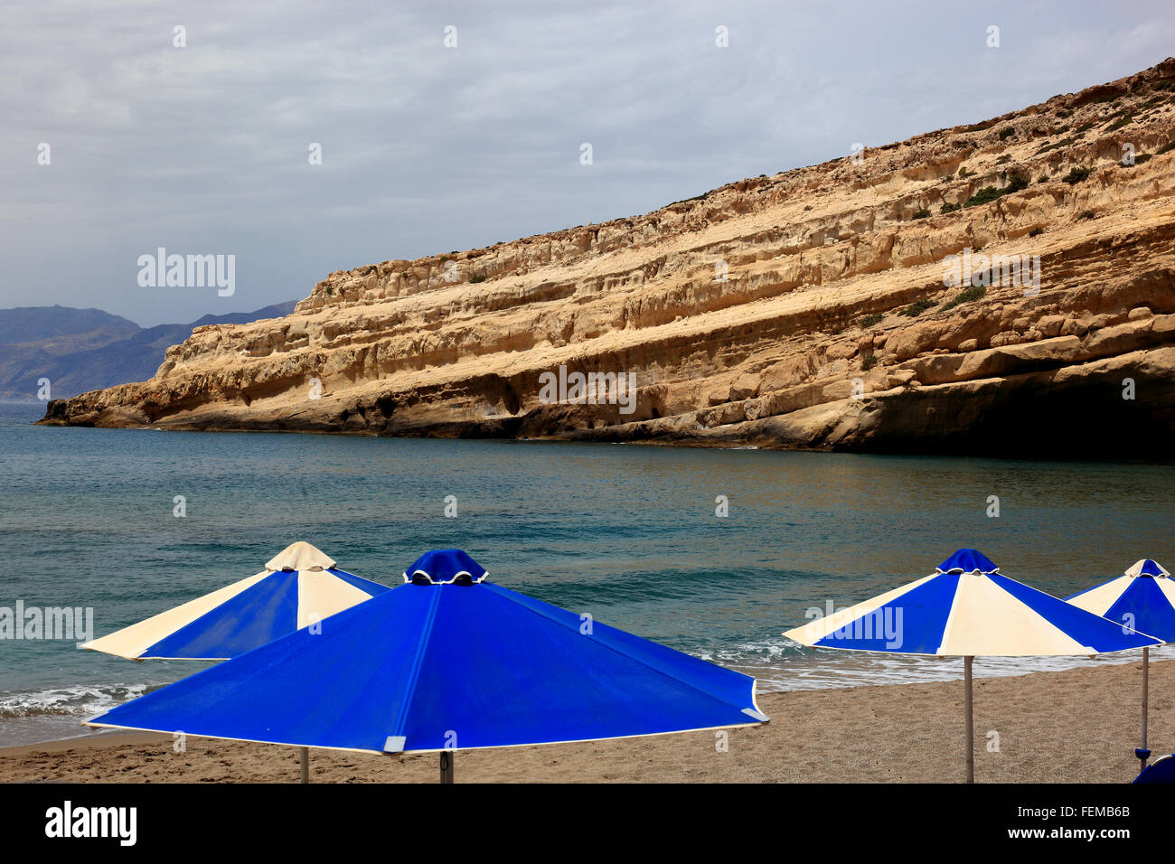 Crete, Matala, sandstone rock with caves in the bay of Messara and ...