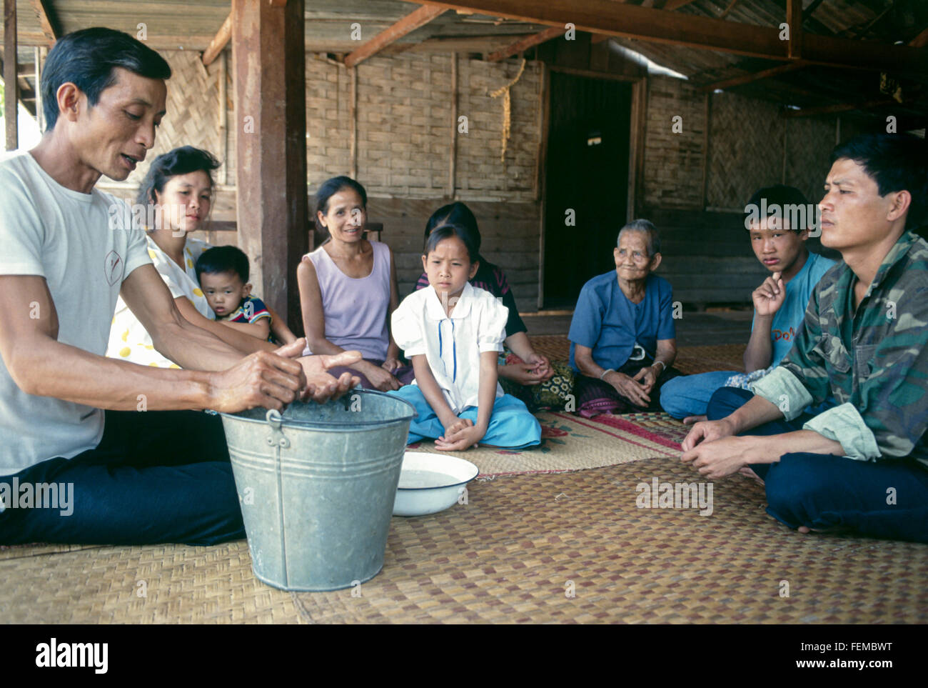 Local health workers teach villagers the importance of washing hands ...
