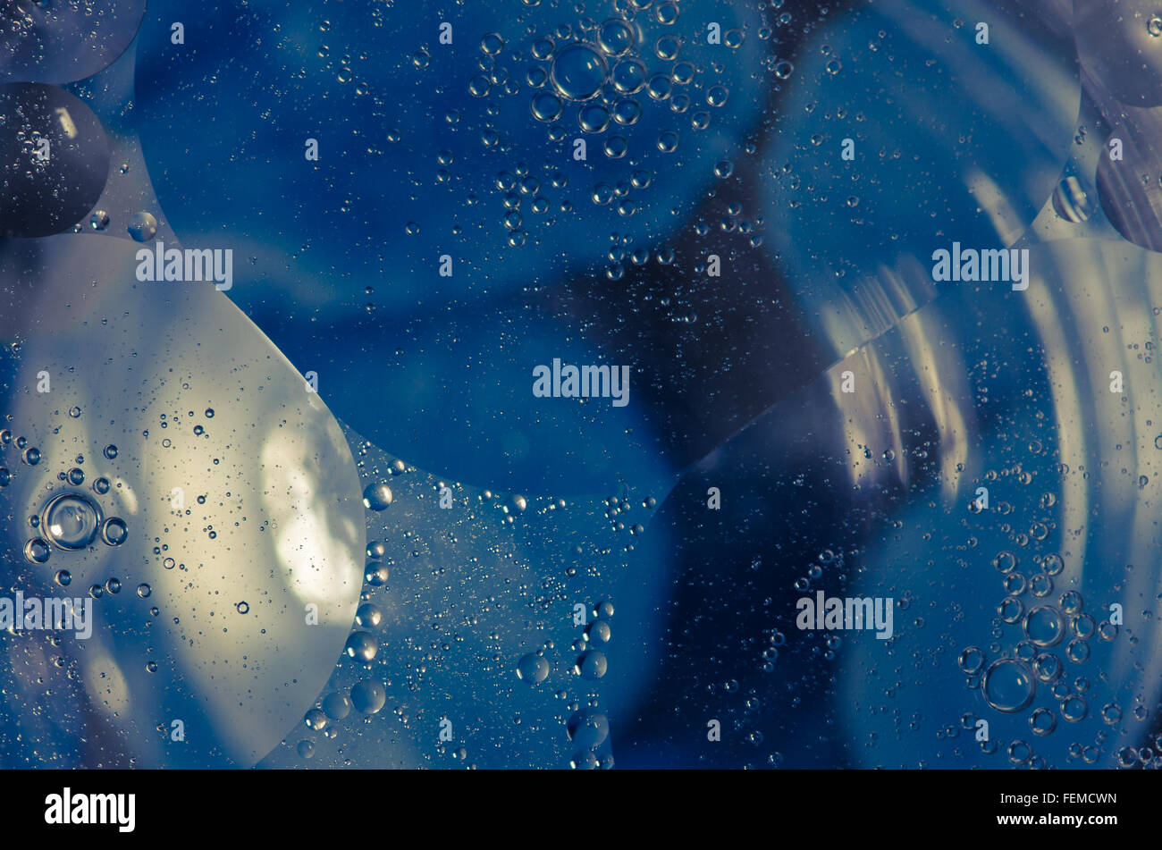 neutral blue abstract oily bubbles over water surface Stock Photo - Alamy