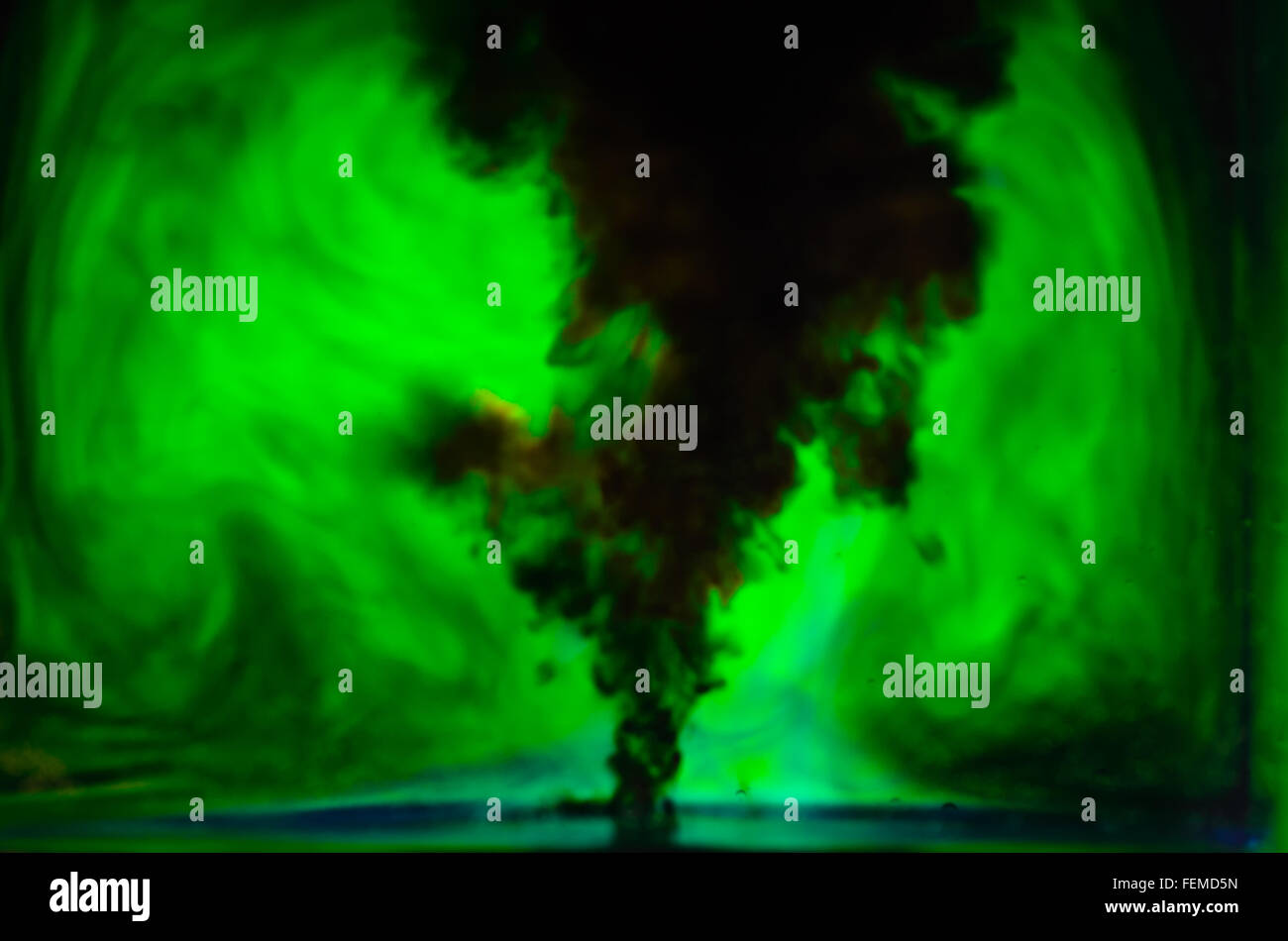 black paint ink explosion into water Stock Photo - Alamy