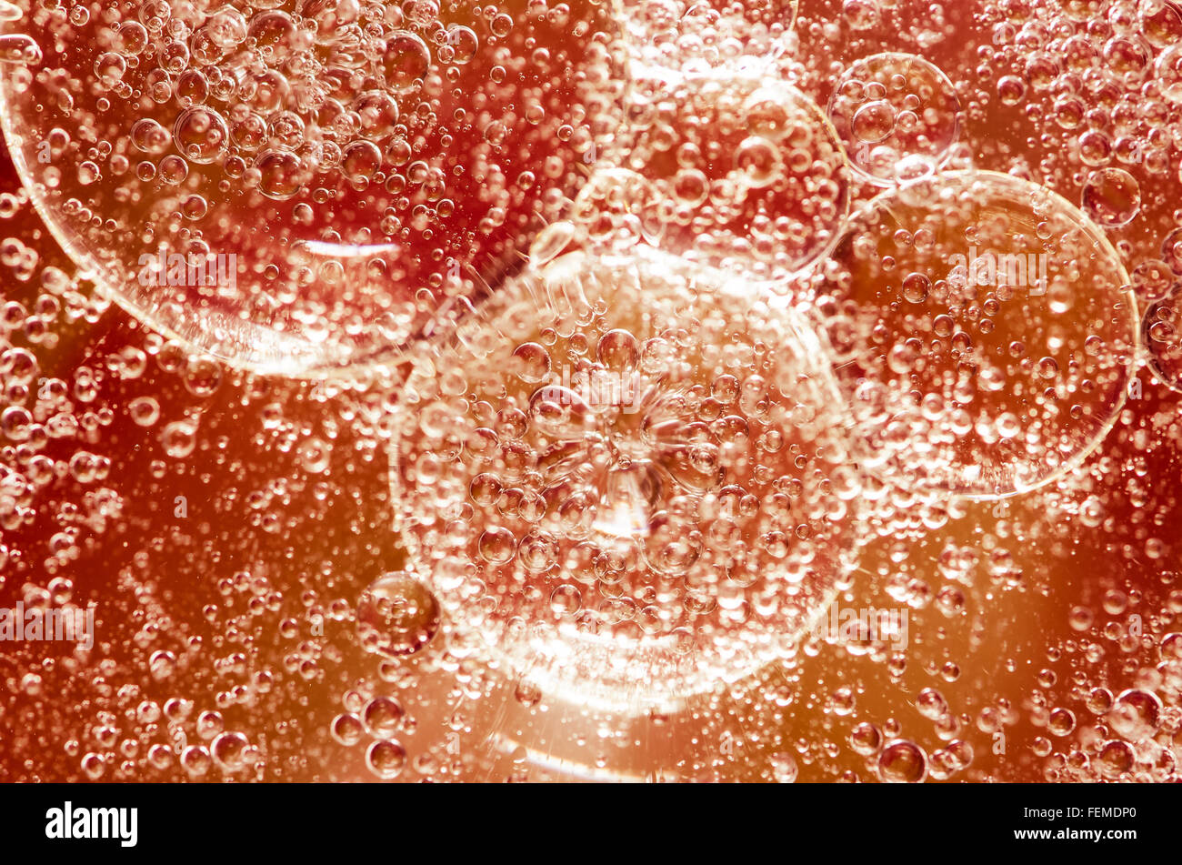 red abstract oily bubbles on water surface Stock Photo - Alamy