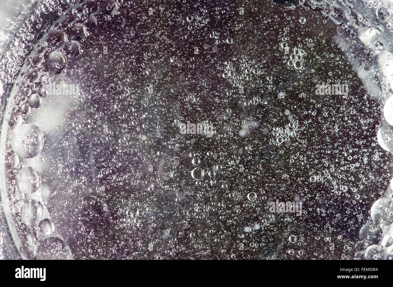oily bubbles over water surface Stock Photo - Alamy