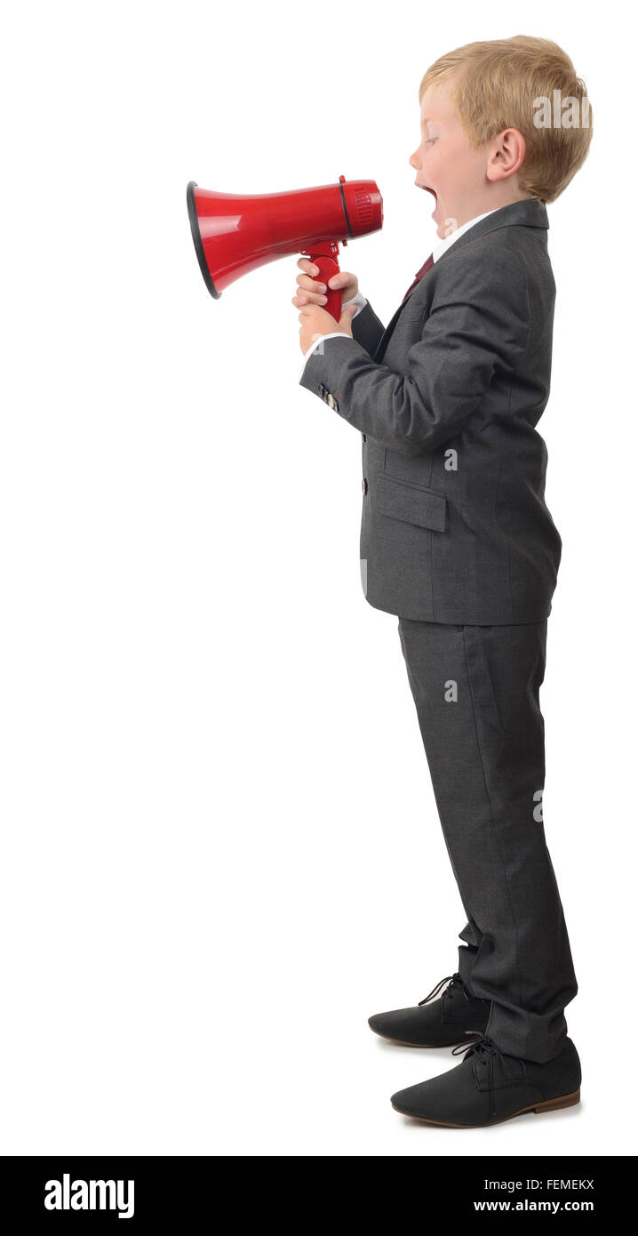 a young boy in suit shouting into a megaphone isolated on a white ...