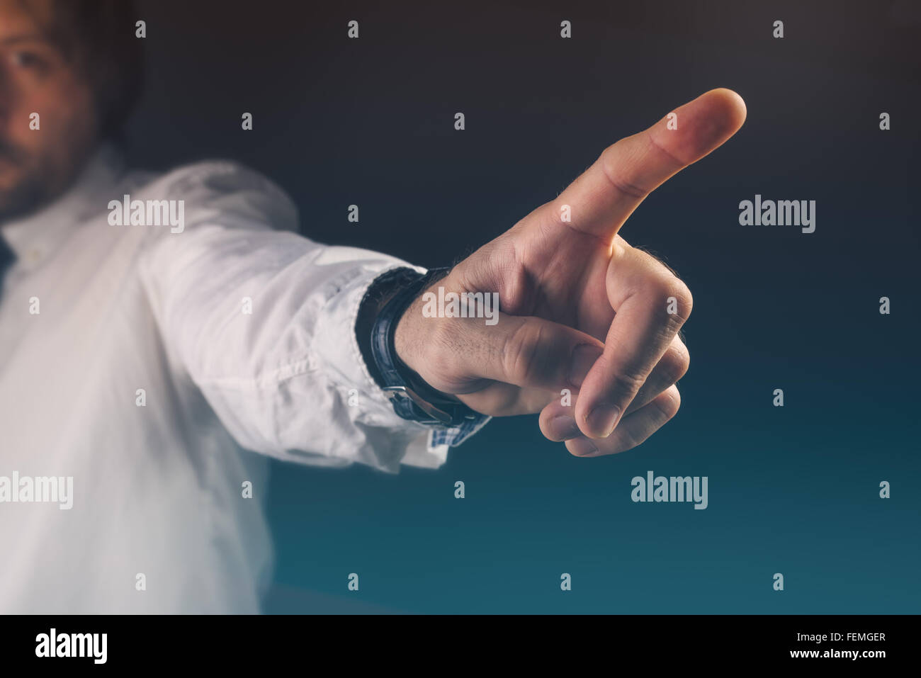 You are fired concept, boss gesturing way out hand sign with index ...