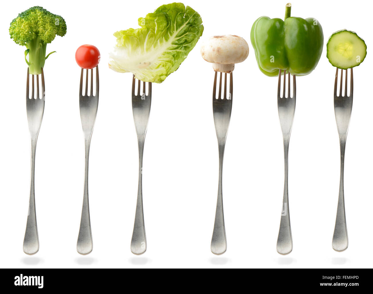 healthy food on a fork. Isolated on white Stock Photo - Alamy