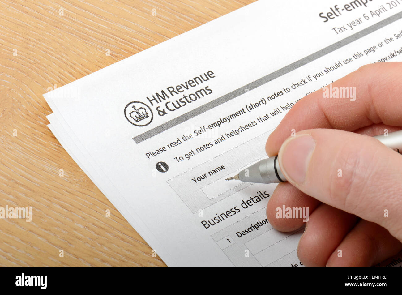 filling in a HM customs form Stock Photo - Alamy