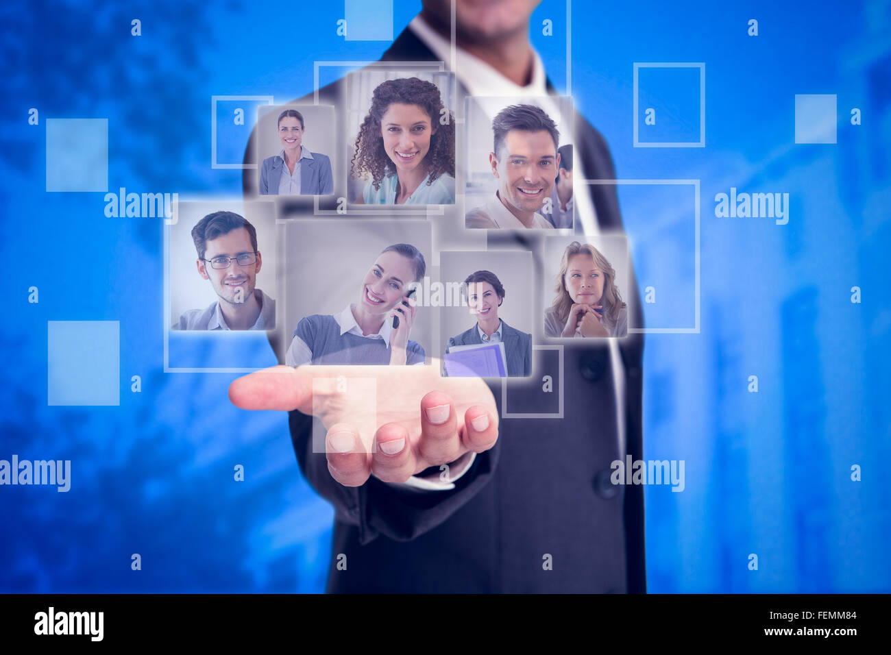 Smiling businessman presenting colleagues hi-res stock photography and ...