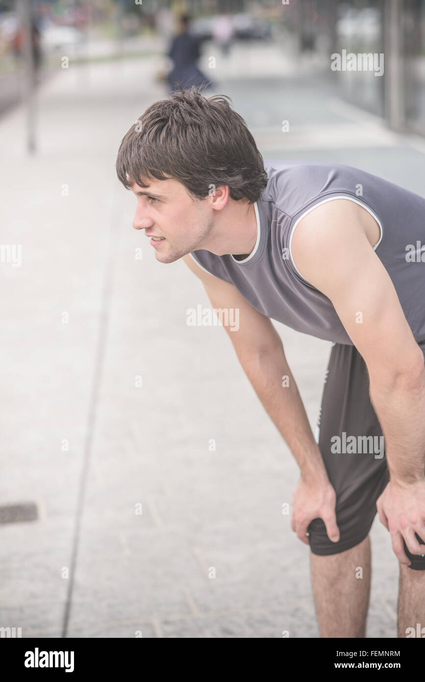 Knee figure of young handsome caucasian brown hair sportive man ...