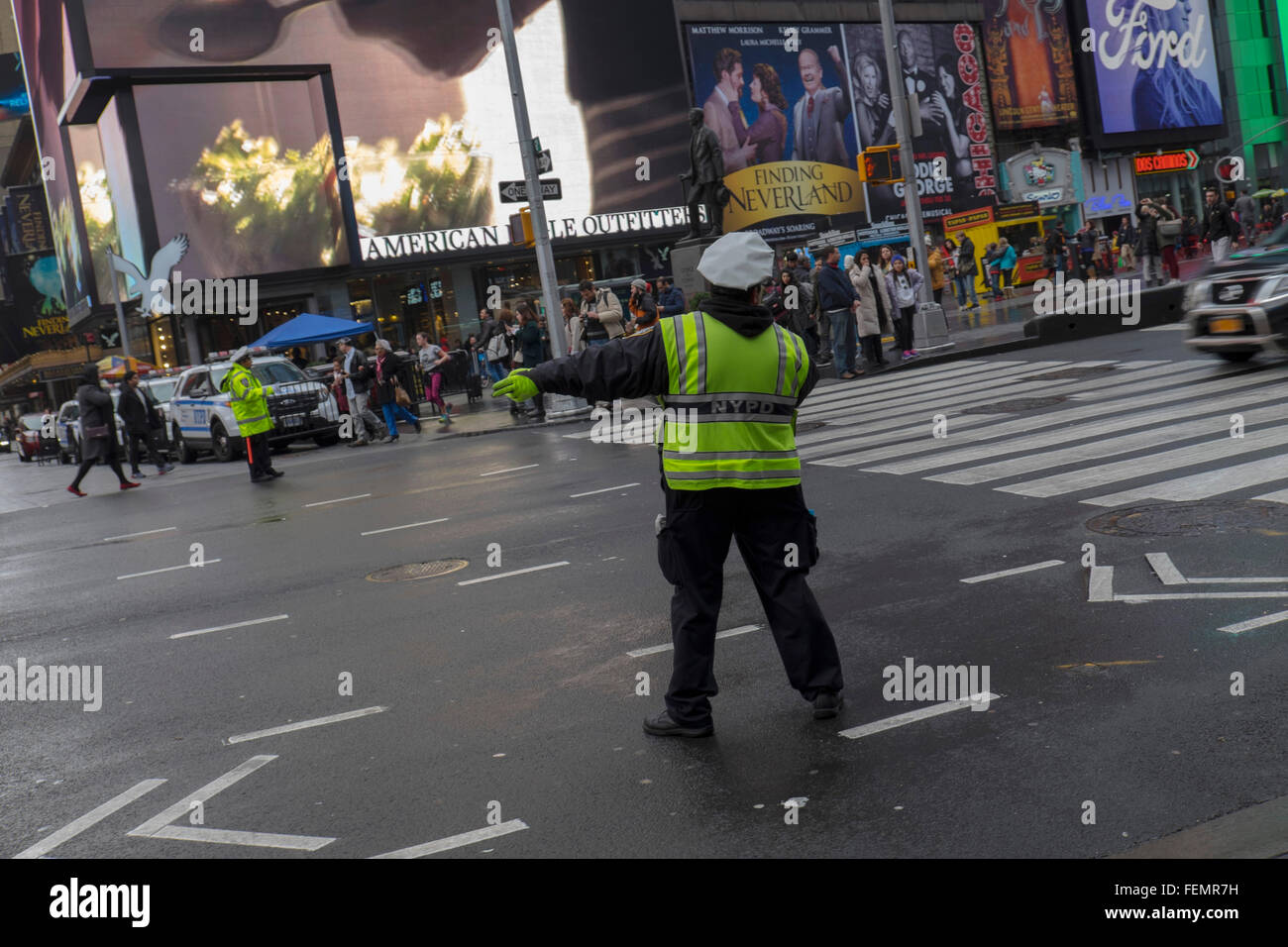 New York Police Department traffic officer, directing traffic in busy ...