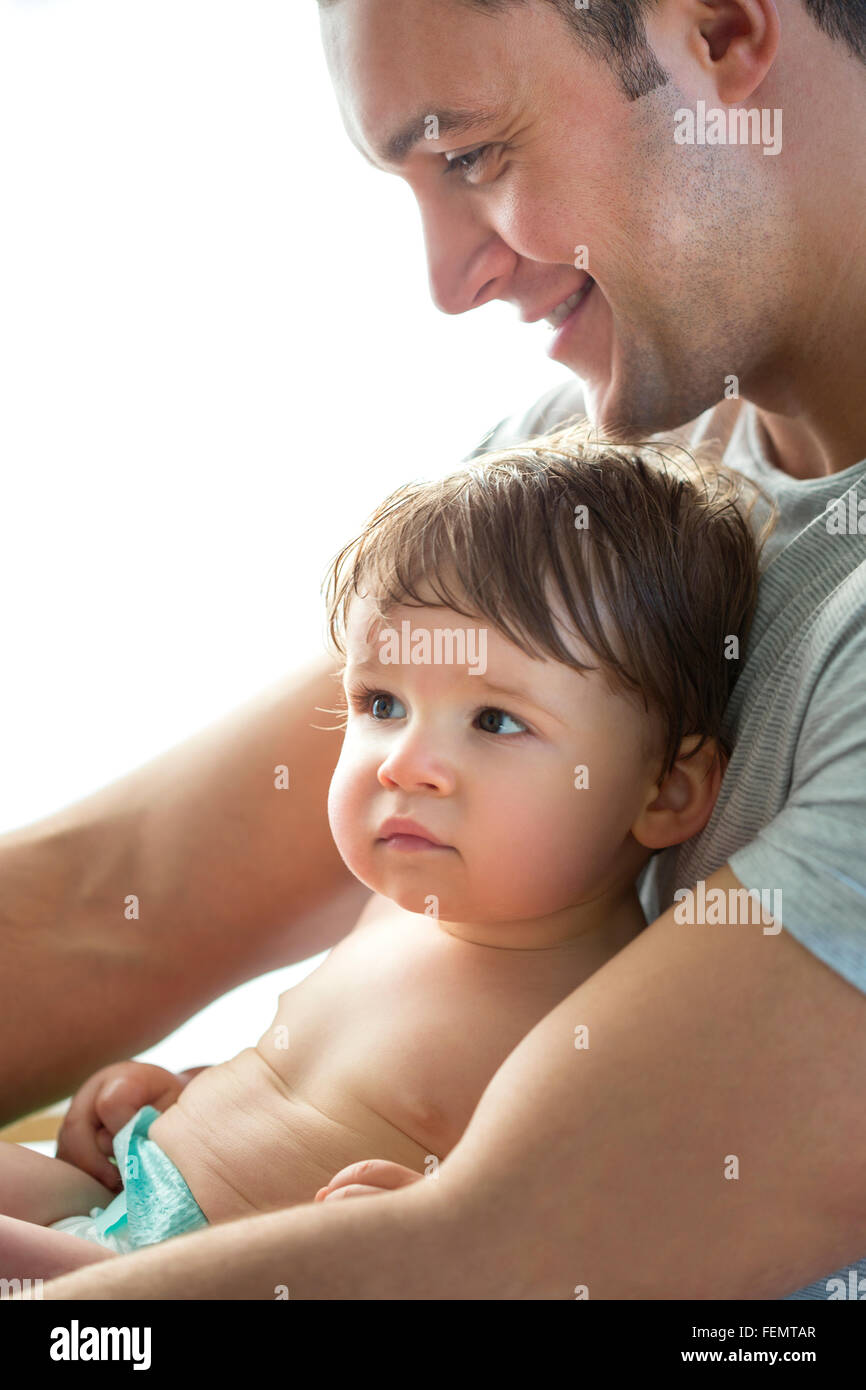 Father cuddling his baby son Stock Photo - Alamy