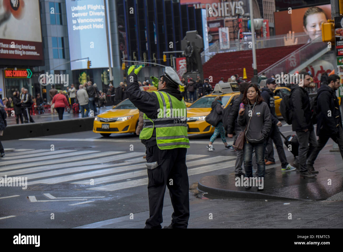 New York Police Department traffic officer, directing traffic in busy ...