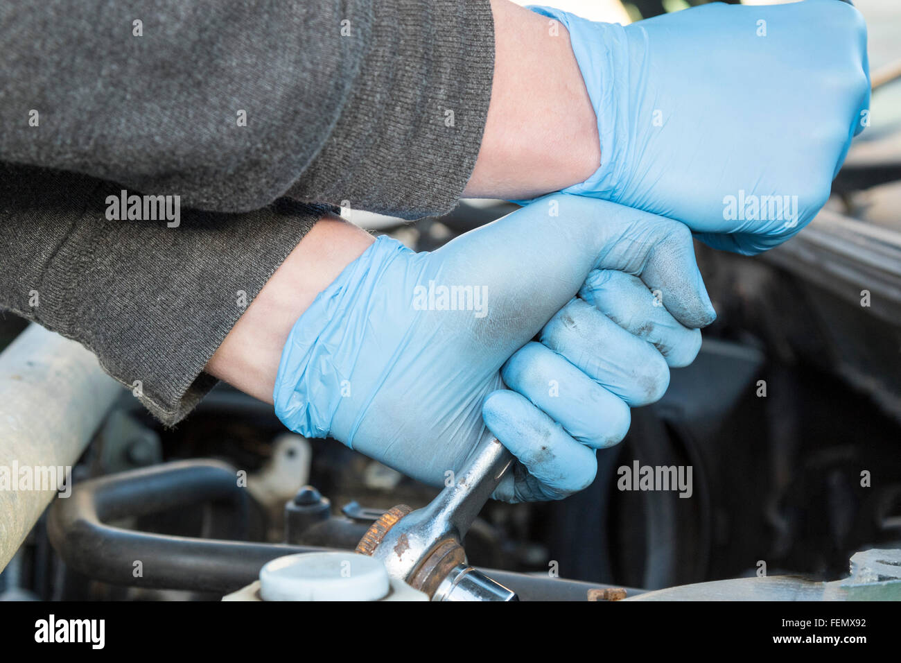 Mechanic hands working engine hi-res stock photography and images - Alamy
