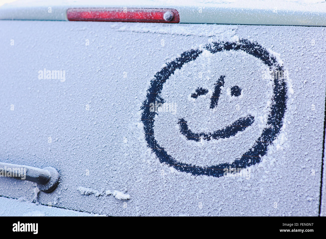 Drawing on the rear window of a car made by hand Stock Photo - Alamy