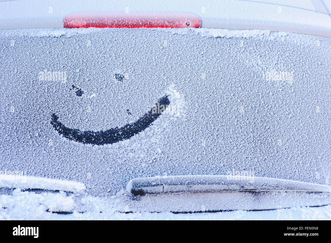 Drawing on the rear window of a car made by hand Stock Photo - Alamy