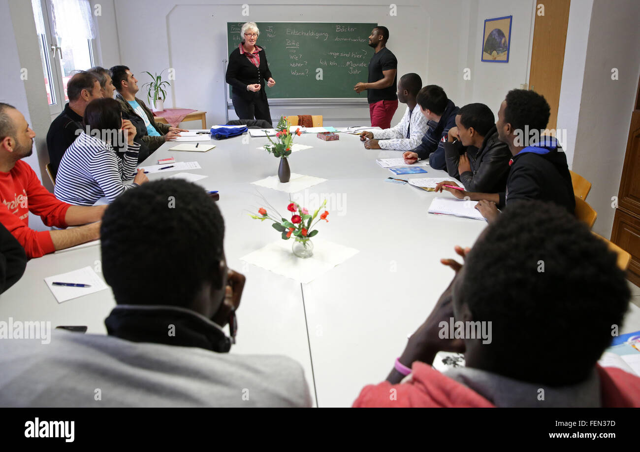 Carmen Hahn teaching German to refugees in the shared accomodation in ...