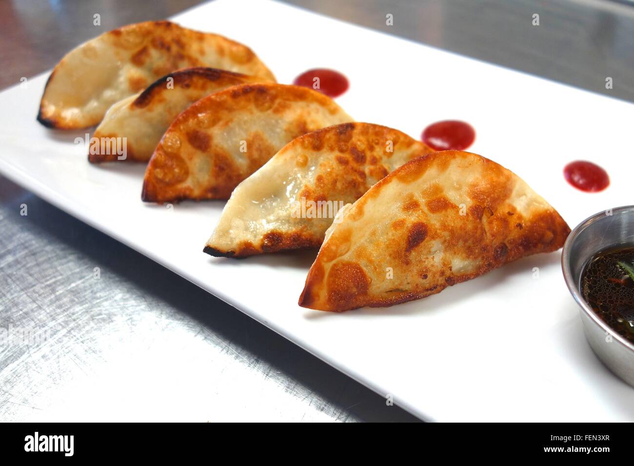 Pork and chive dumplings. "Mandu" in Korean Stock Photo - Alamy