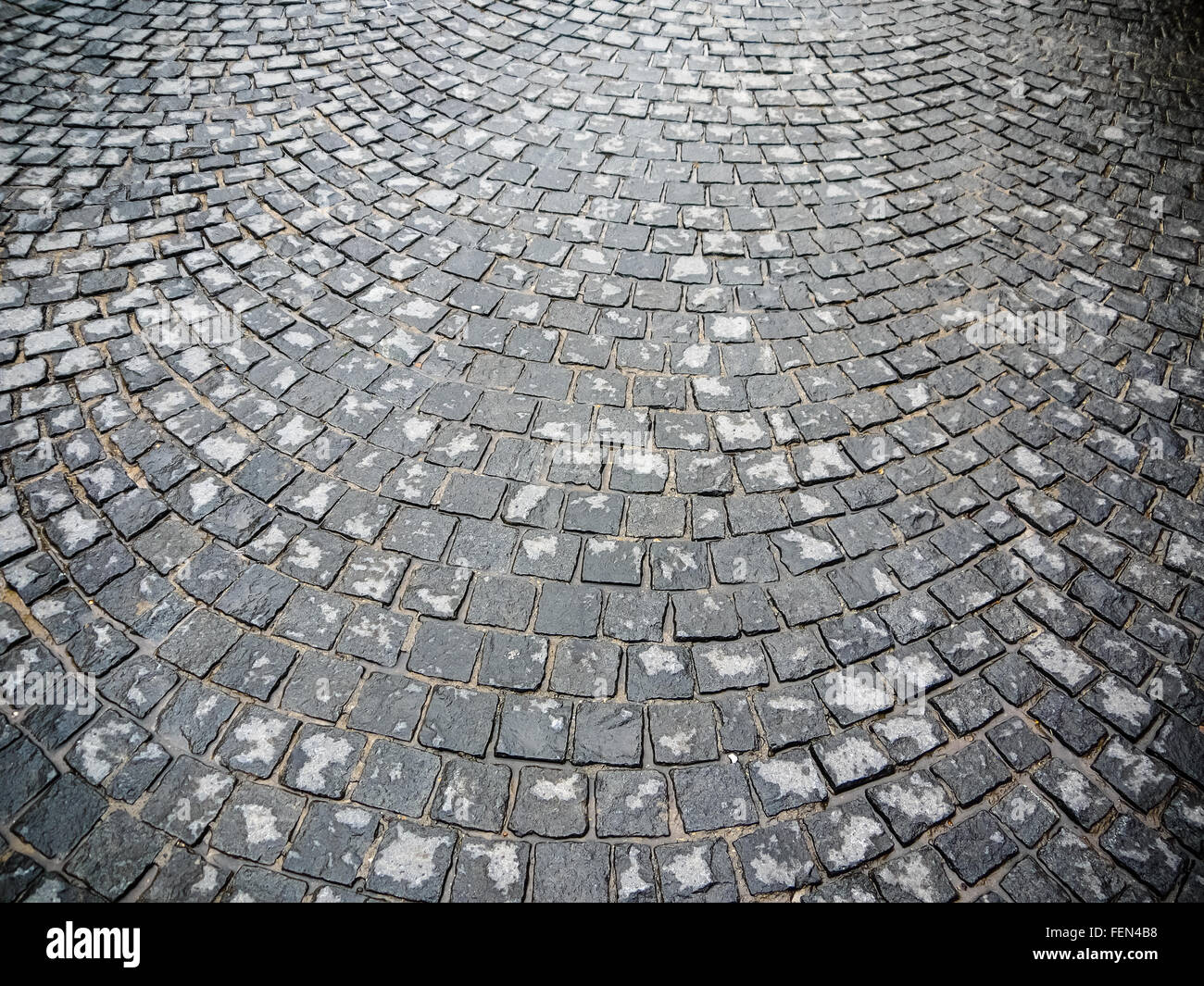 Close up of sett pavement in the rain by day Stock Photo - Alamy
