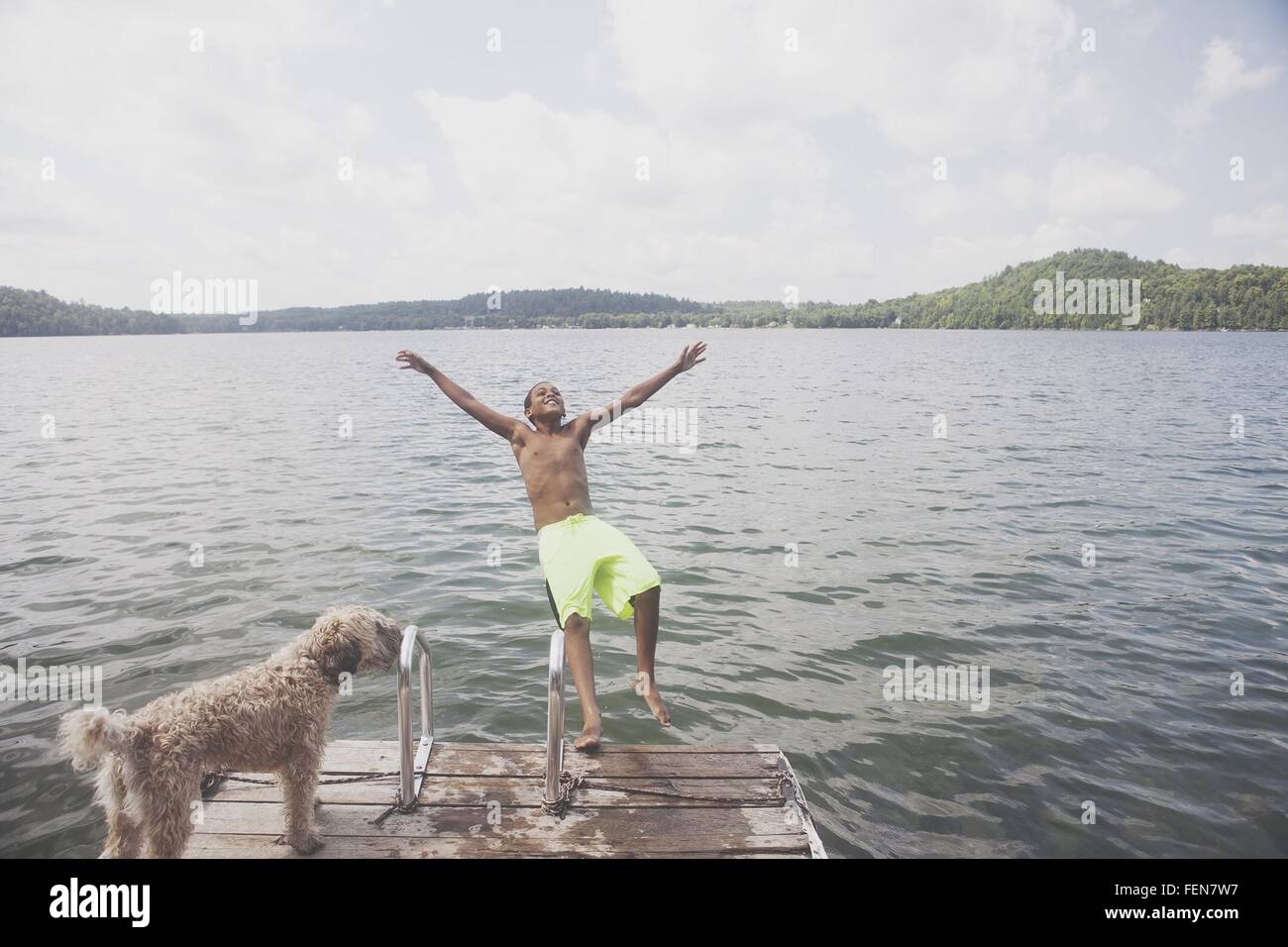 Boy falling into water hi-res stock photography and images - Alamy