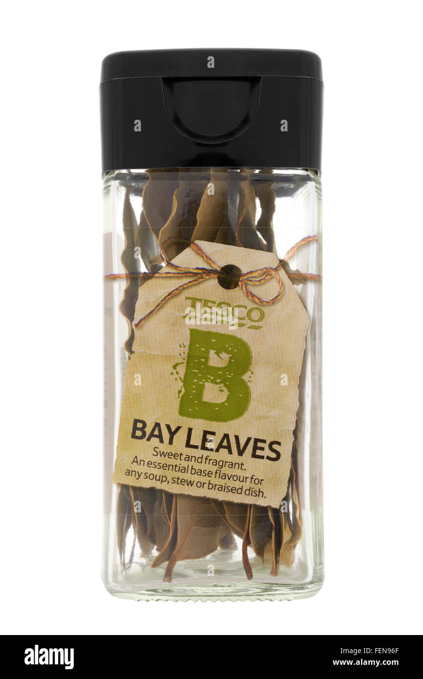Jar of bay leaves on white background Stock Photo - Alamy
