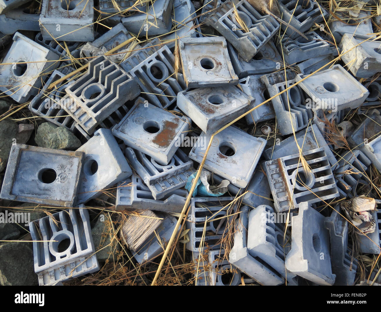 Big pile of used railway sleeper clips next to railway line, Alora ...