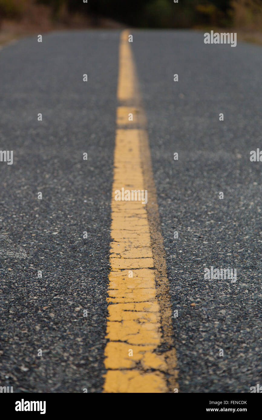 Road Closeup with Yellow Line Stock Photo - Alamy