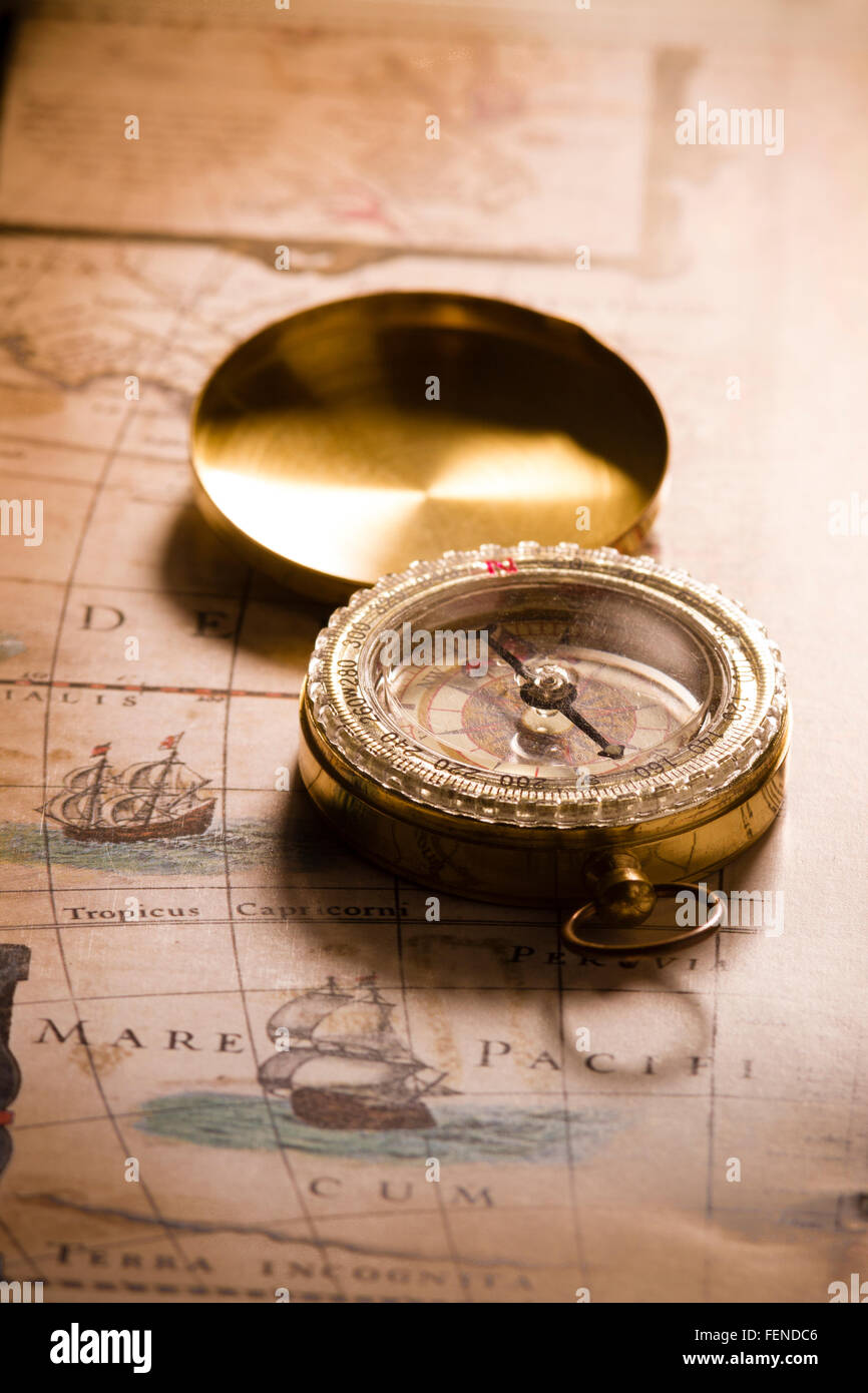 Close-Up Of Navigational Compass On Map Stock Photo - Alamy