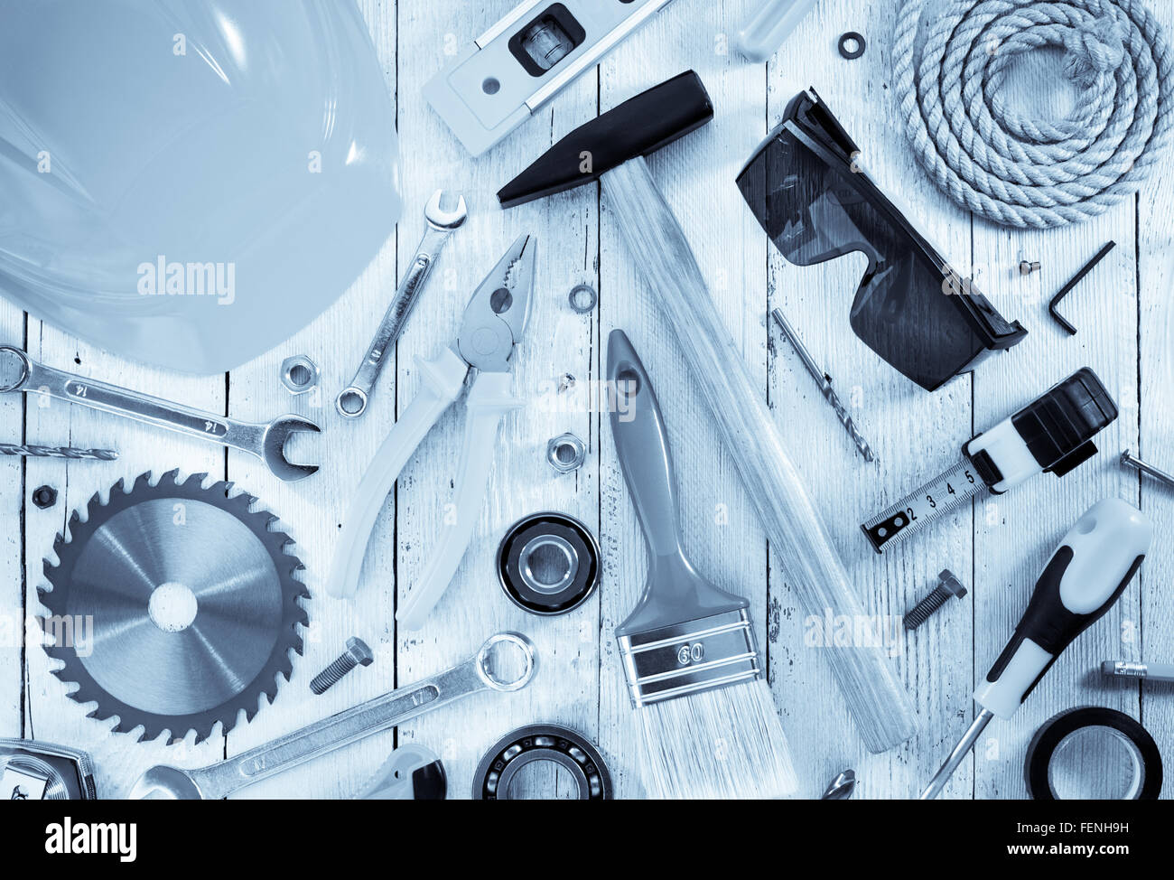 work tools and instruments on wooden background Stock Photo - Alamy