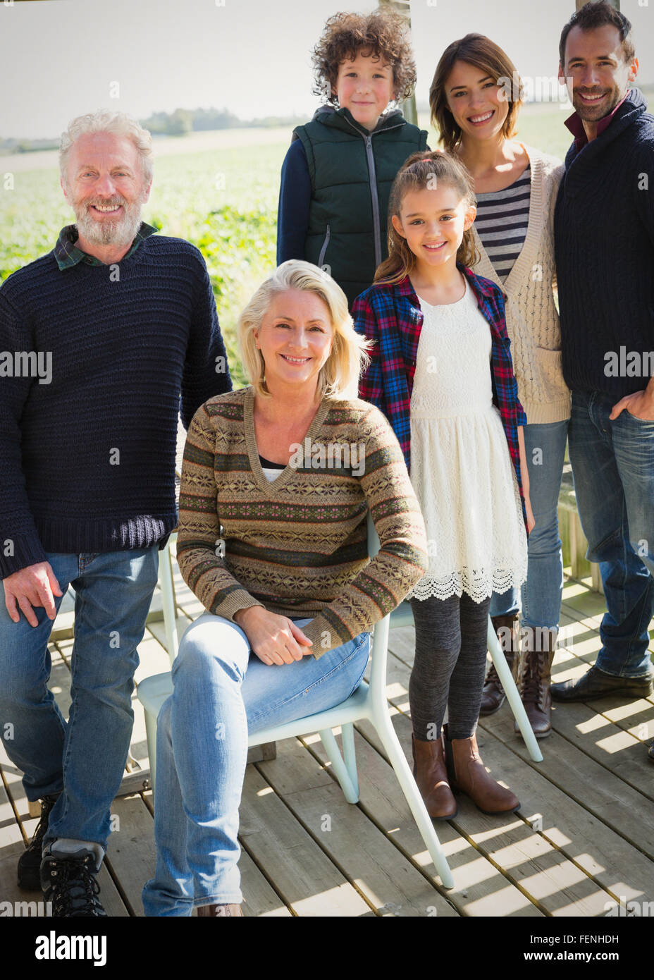 Portrait smiling multi-generation family on porch Stock Photo - Alamy