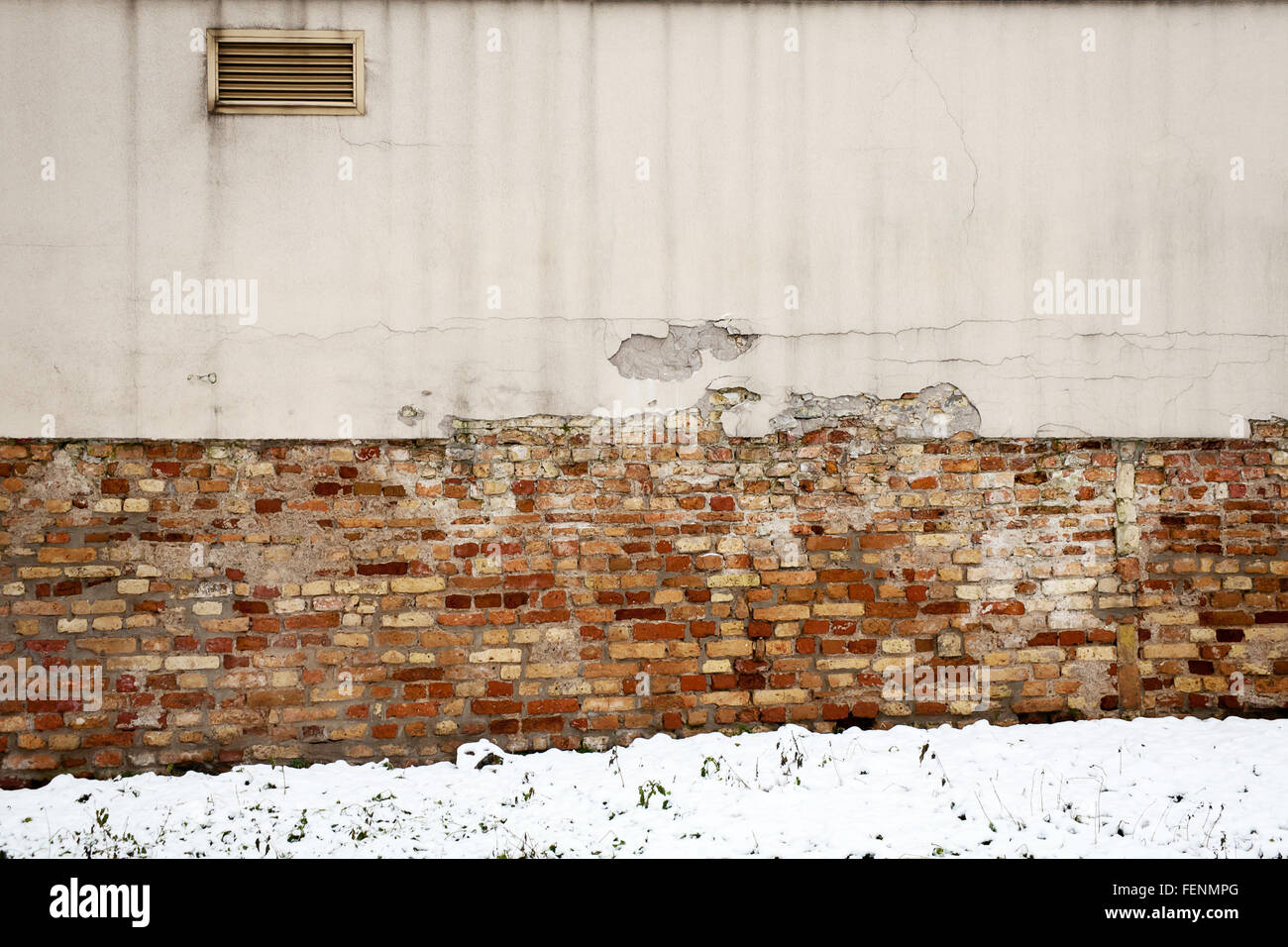 Old wall and a ground covered with snow Stock Photo - Alamy